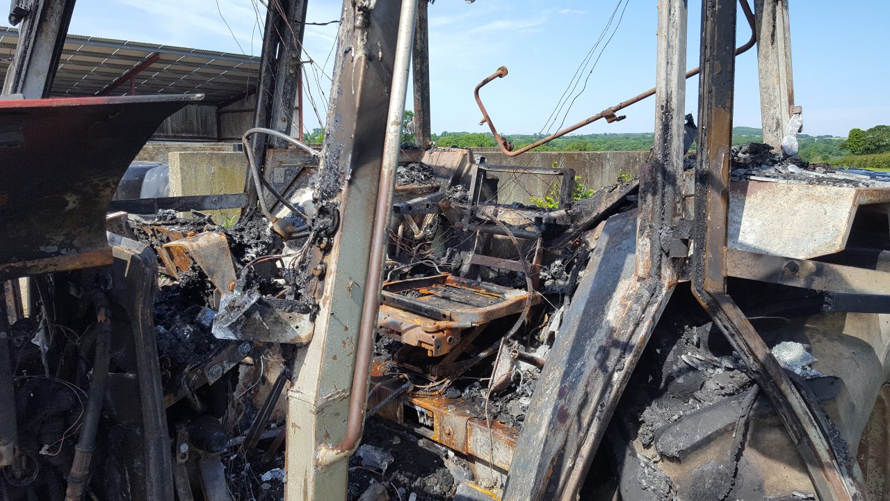 Pics: Tractor engulfed in flames while drawing in bales - Agriland.ie