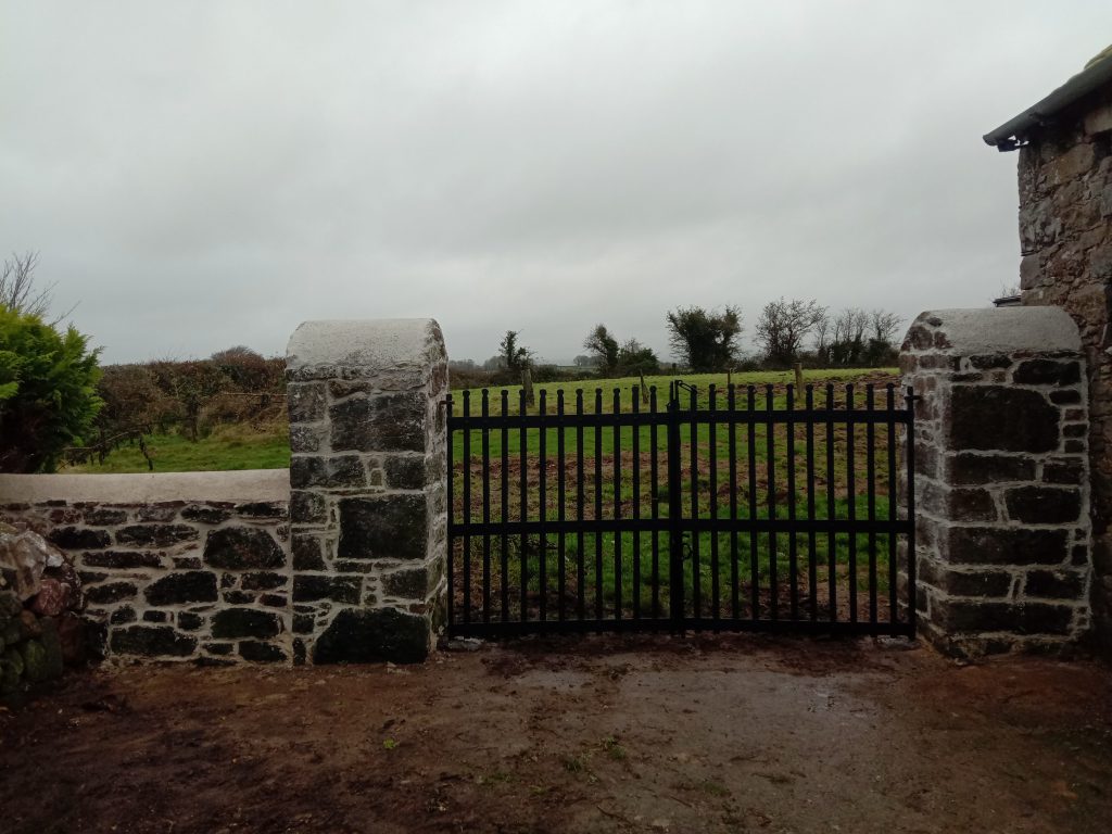 Farmyard wrought iron gates and stone piers preserved - Agriland.ie